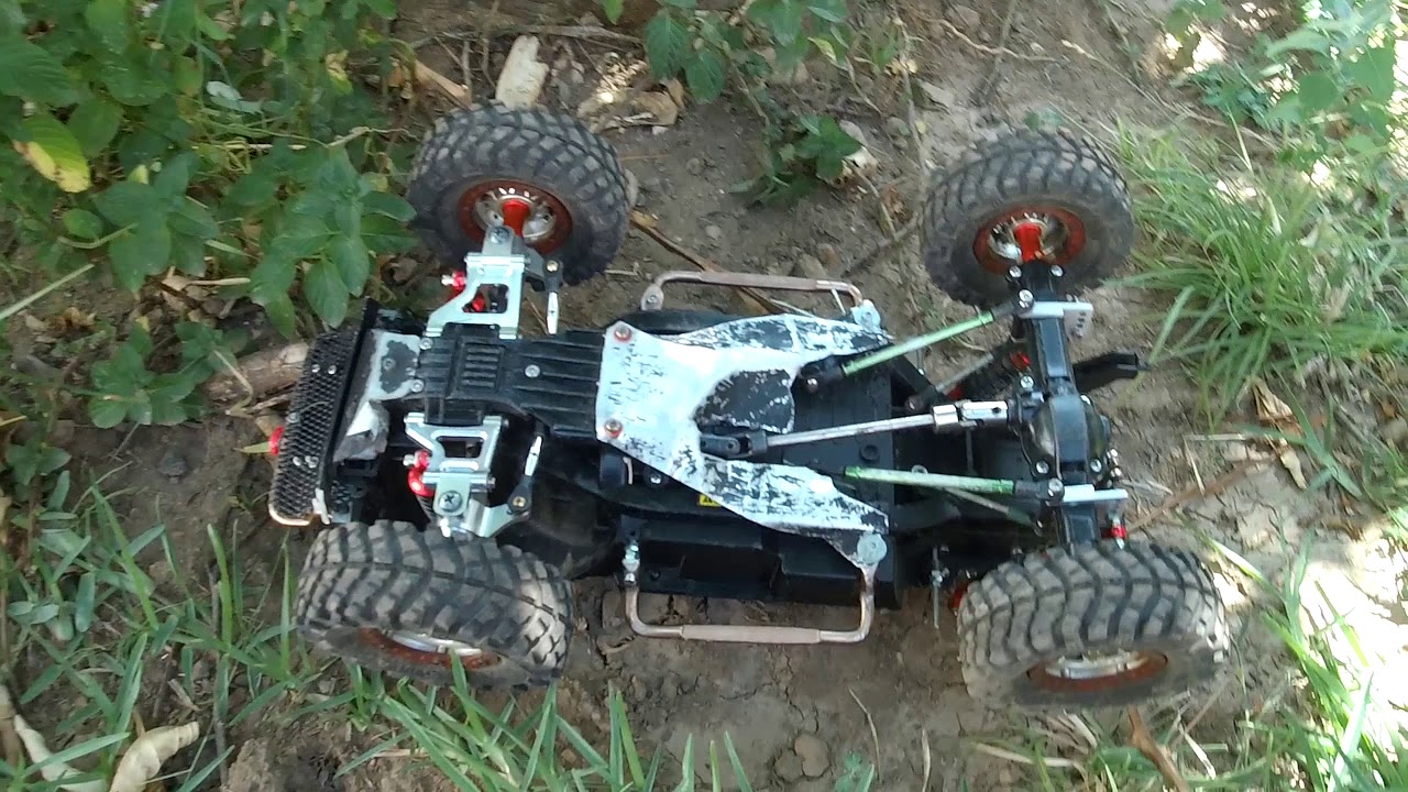 Tamiya CC01 Isuzu Mu "MOD" CHASSIS climbing trees & grass :) - YouTube