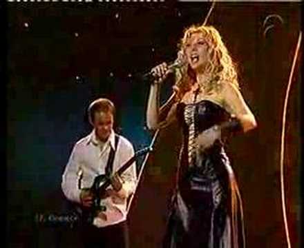 Singer in leather dress - YouTube
