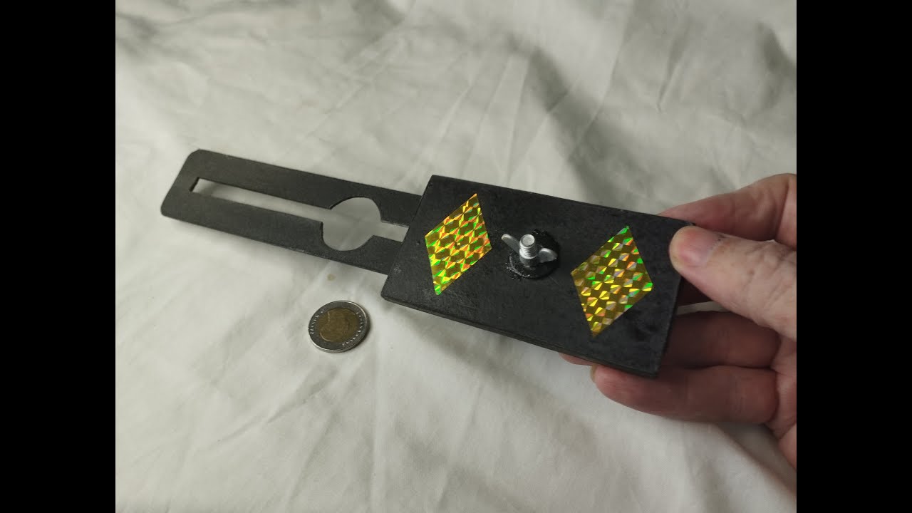 Coin through bolt magic trick revealed & how to make. - YouTube