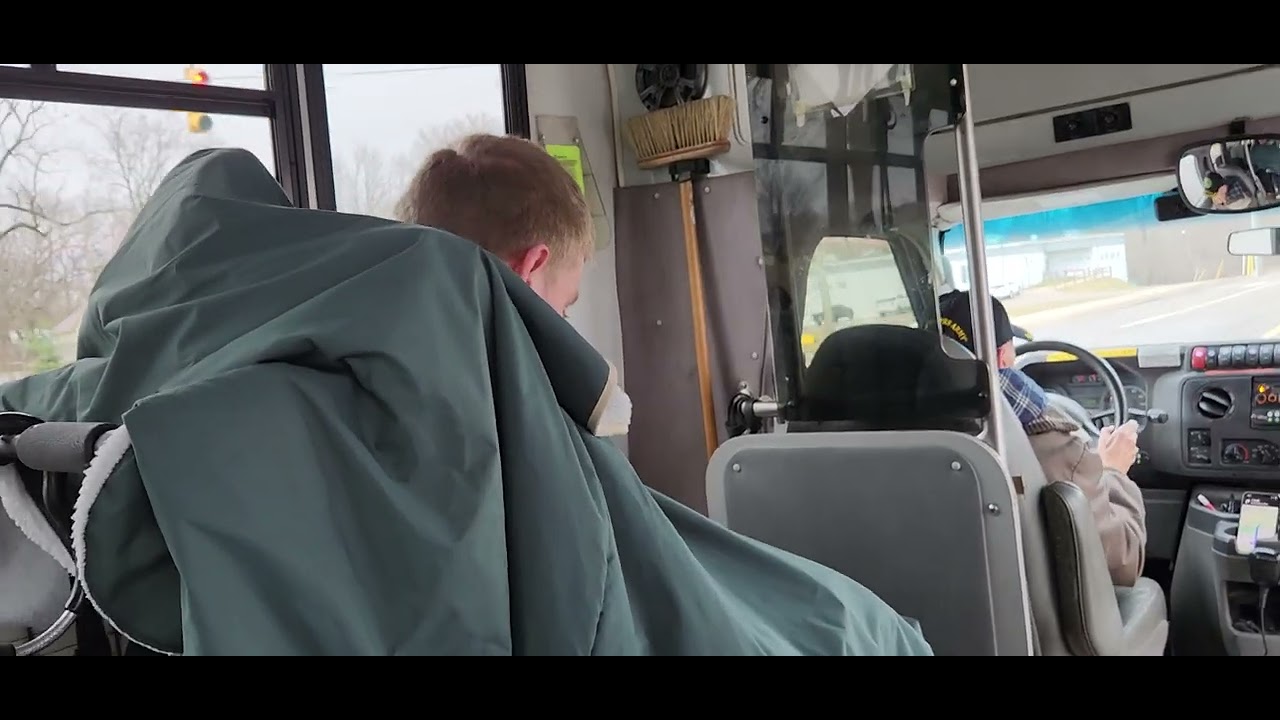 Sam riding bata bus home from school w/ Aunt Pam & bus driver Stoney ...