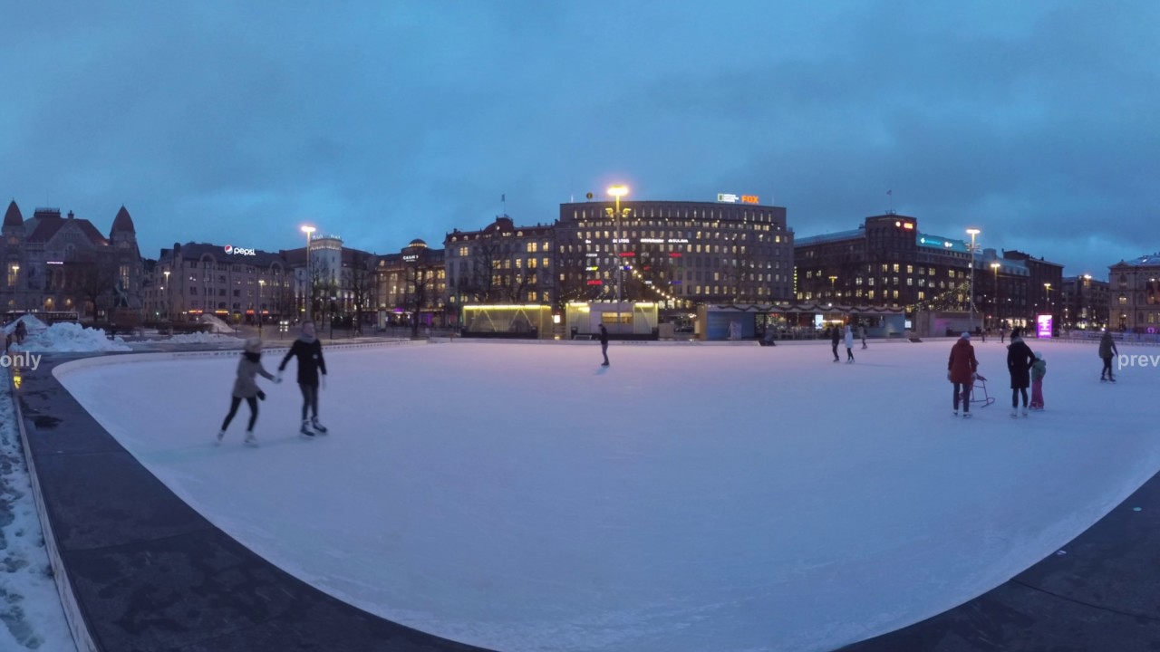 360 VR Railway Station and people on skating rink in evening Helsinki ...