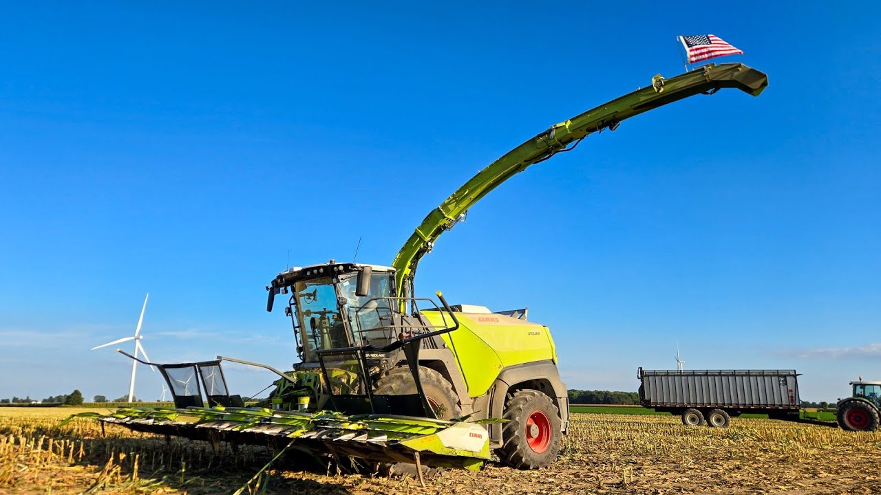 Claas Jaguar 1200 and 14 row corn head with 2 Jaguar 990's - YouTube