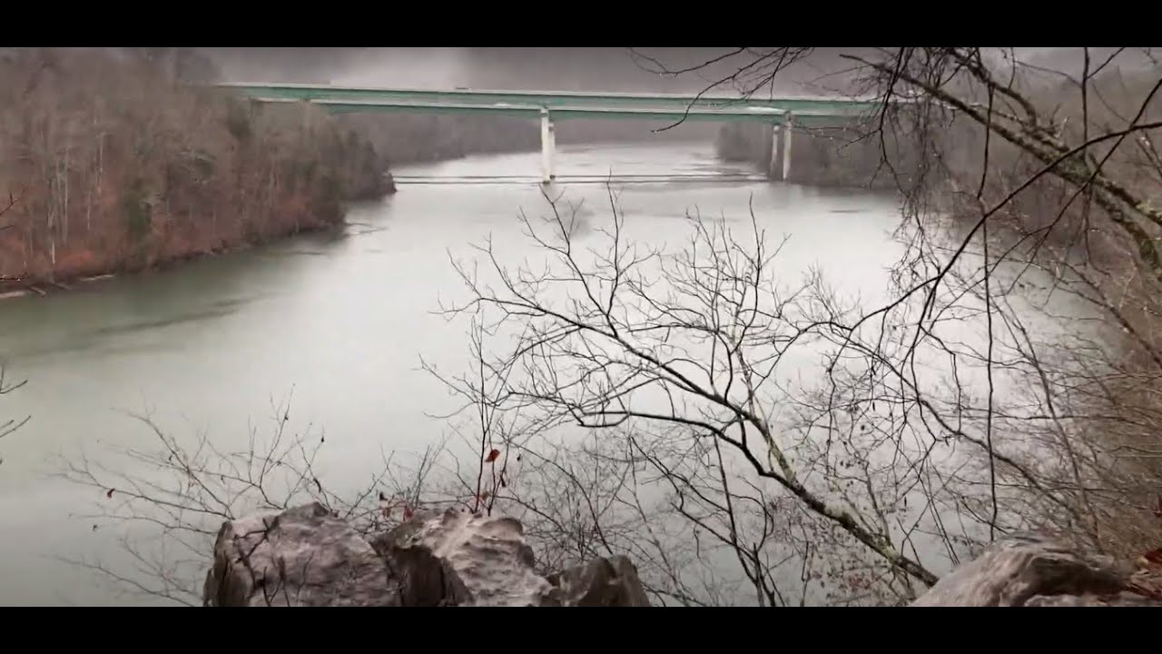 Rainy hike at the cliffs in Warriors' Path State Park near cliffside ...