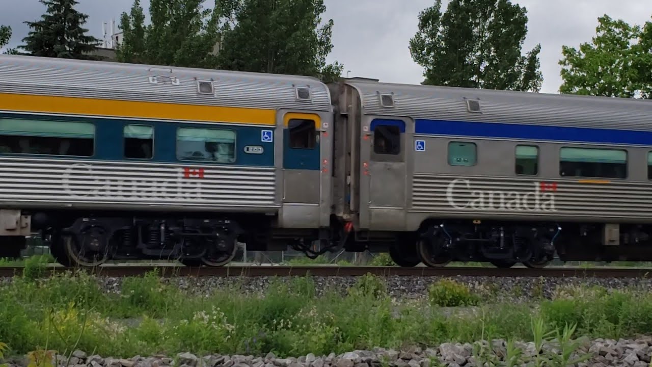 TRAINS VIA Rail Budd Coaches in Three Paint Schemes at St Henri - YouTube