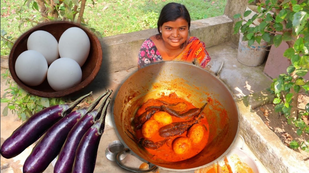 Rural eggplant village style cooking and eating by Santali woman//village cooking and eating ...