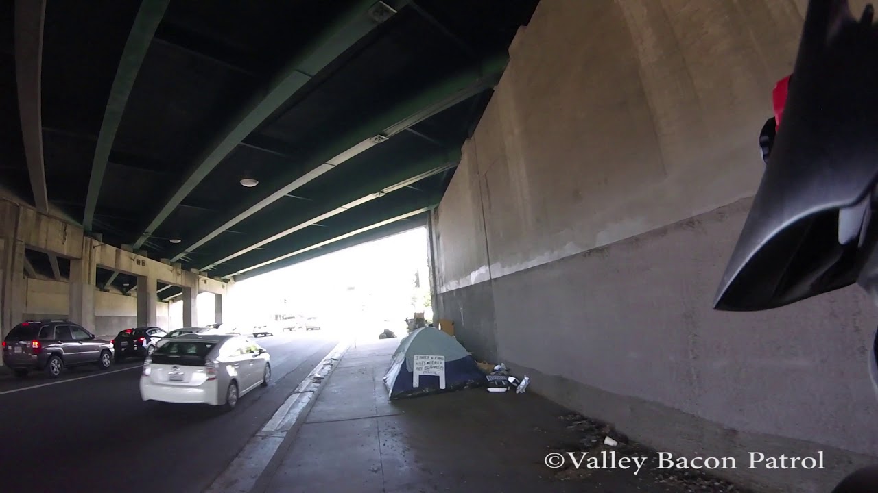 Man Sleeping in Fetal Position Under Bridge - YouTube