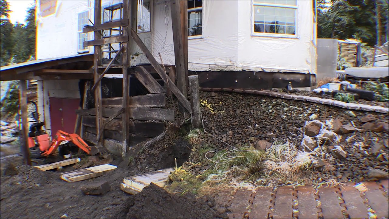 Building a new porch; digging out for footings - YouTube