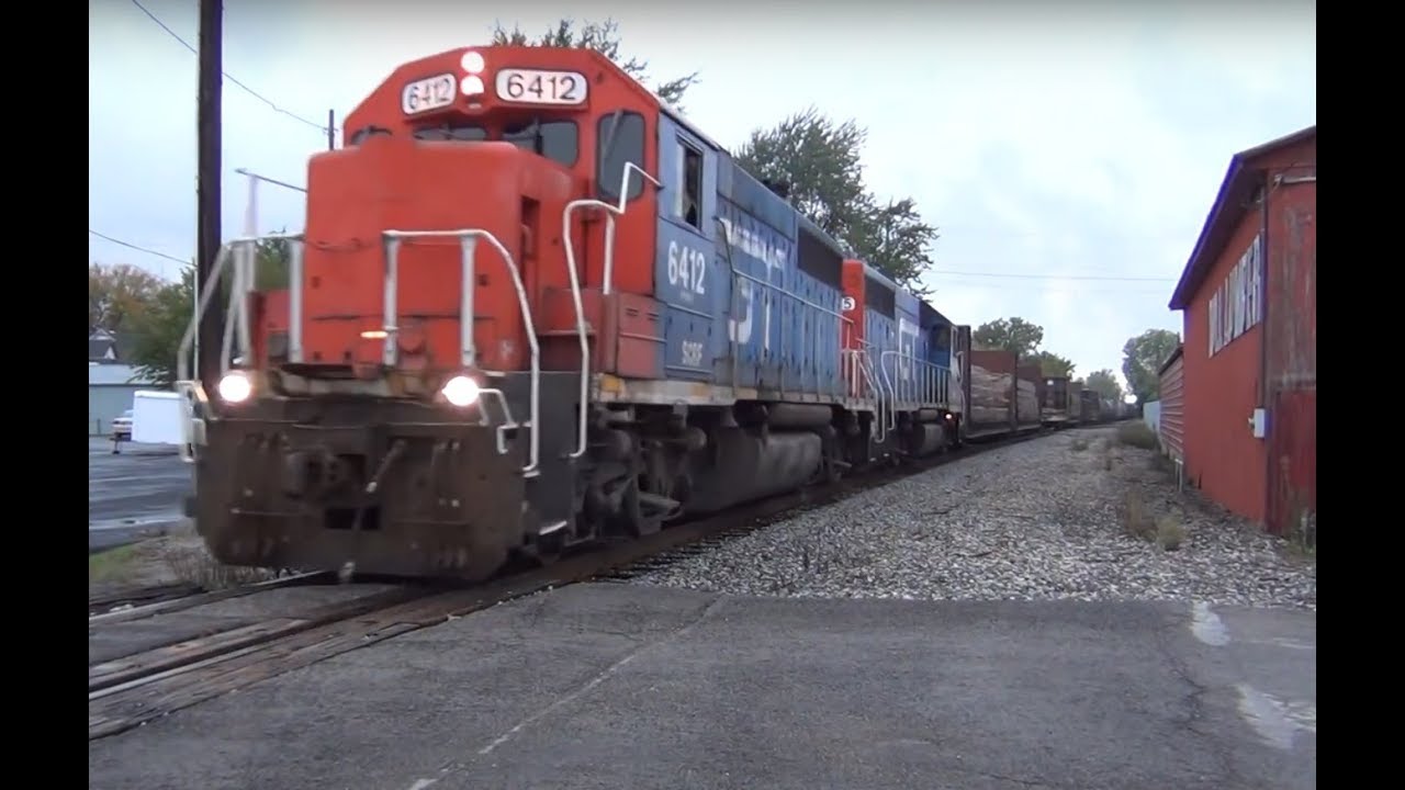 GTW pair 6412 and 6415 lead CF&E FWLI through Van Wert Ohio - YouTube