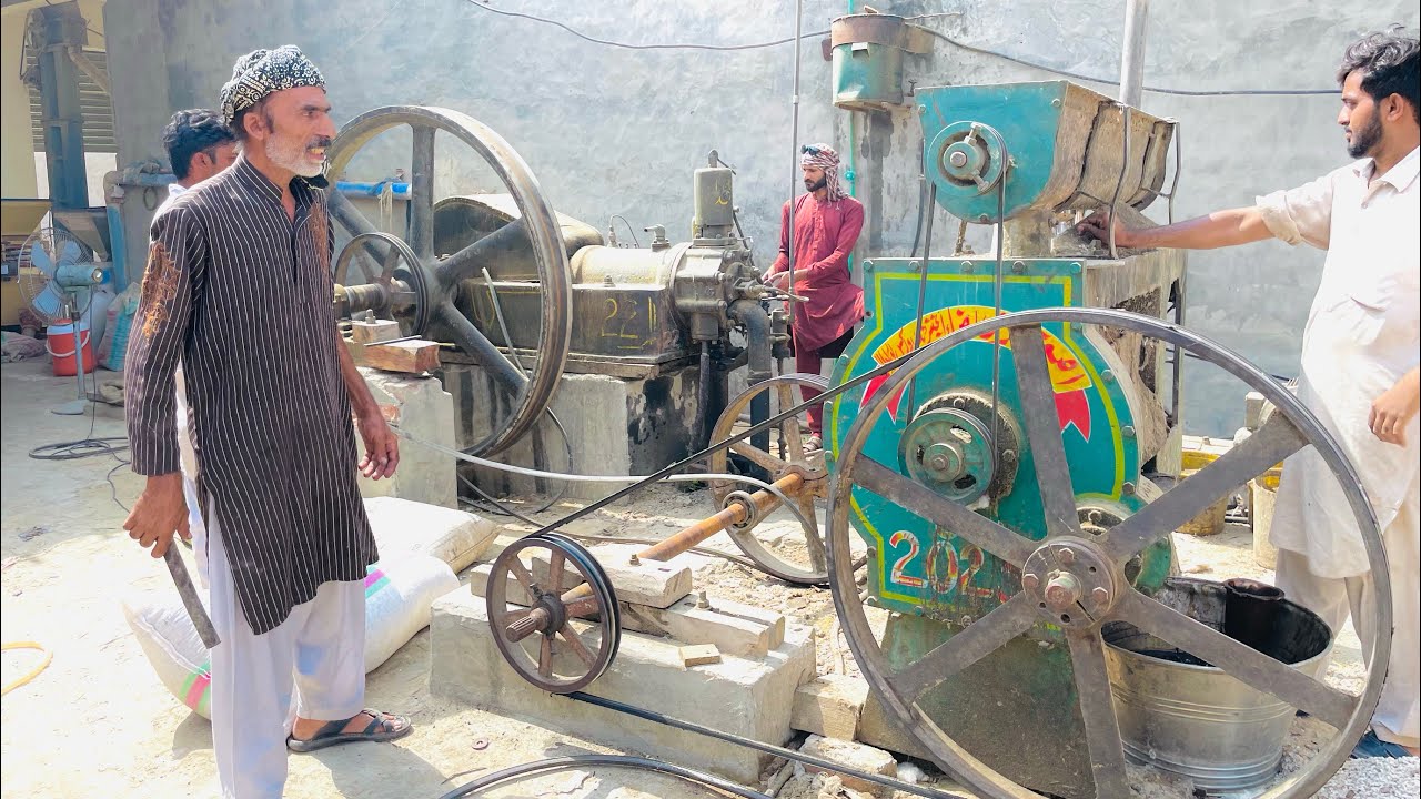Old black engine power full Dasi diesel engine working with oil machine ...