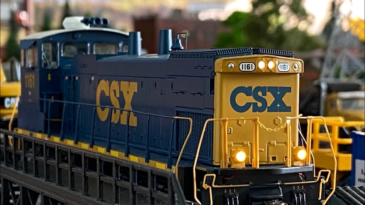 CSX MP15AC #1161 Delivering Heavy Equipment to the Construction Site ...