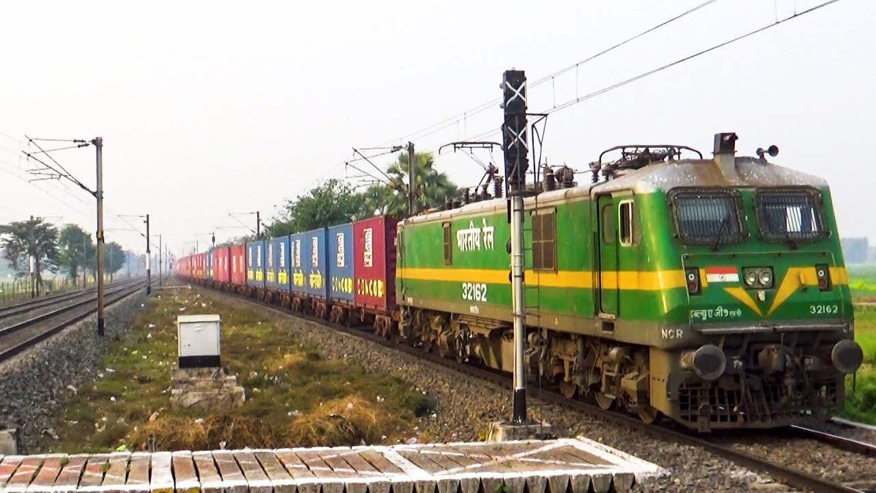 High speed freight train hauled by one of the most powerful electric ...
