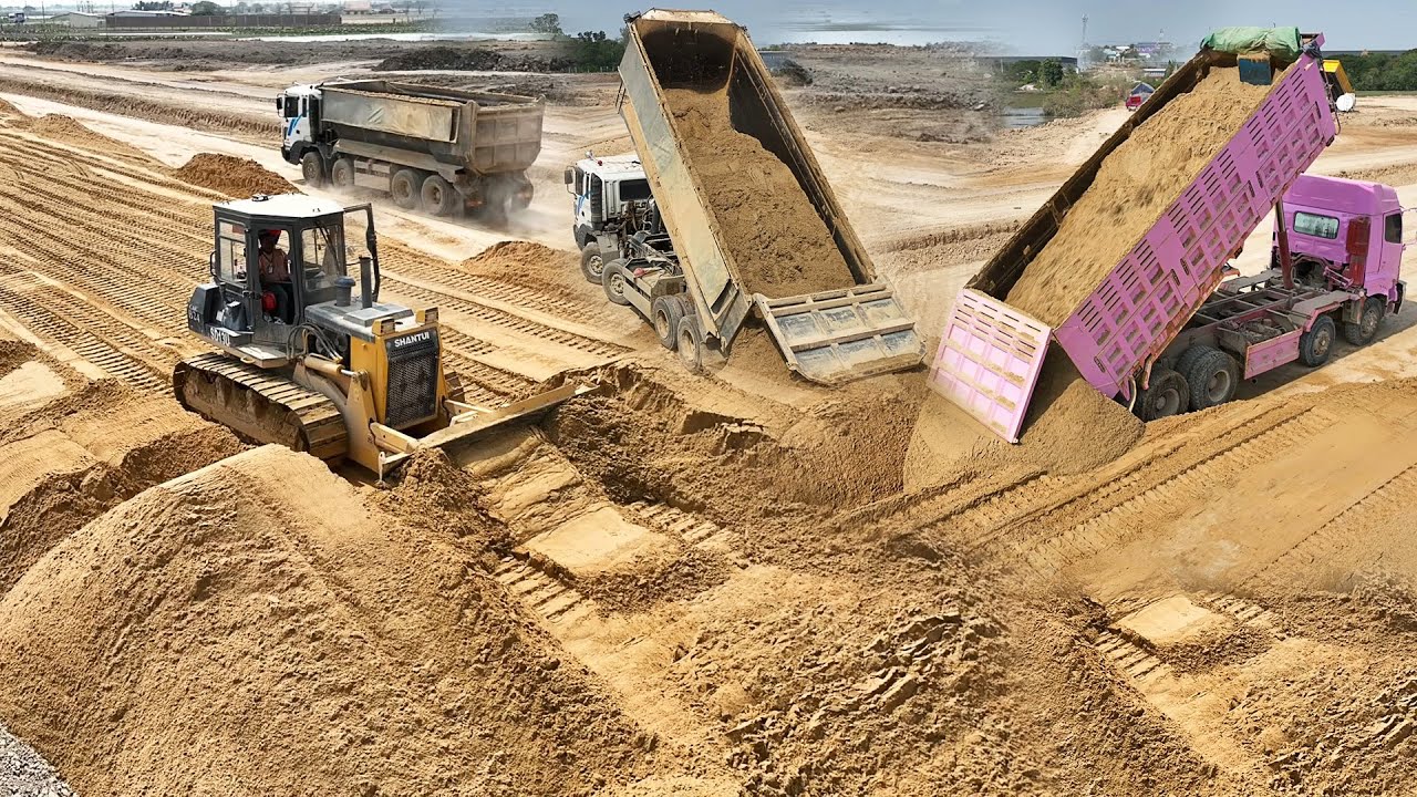 the truck Soil Sand With Bulldozer Clearing Land And Push Soil Sand the ...