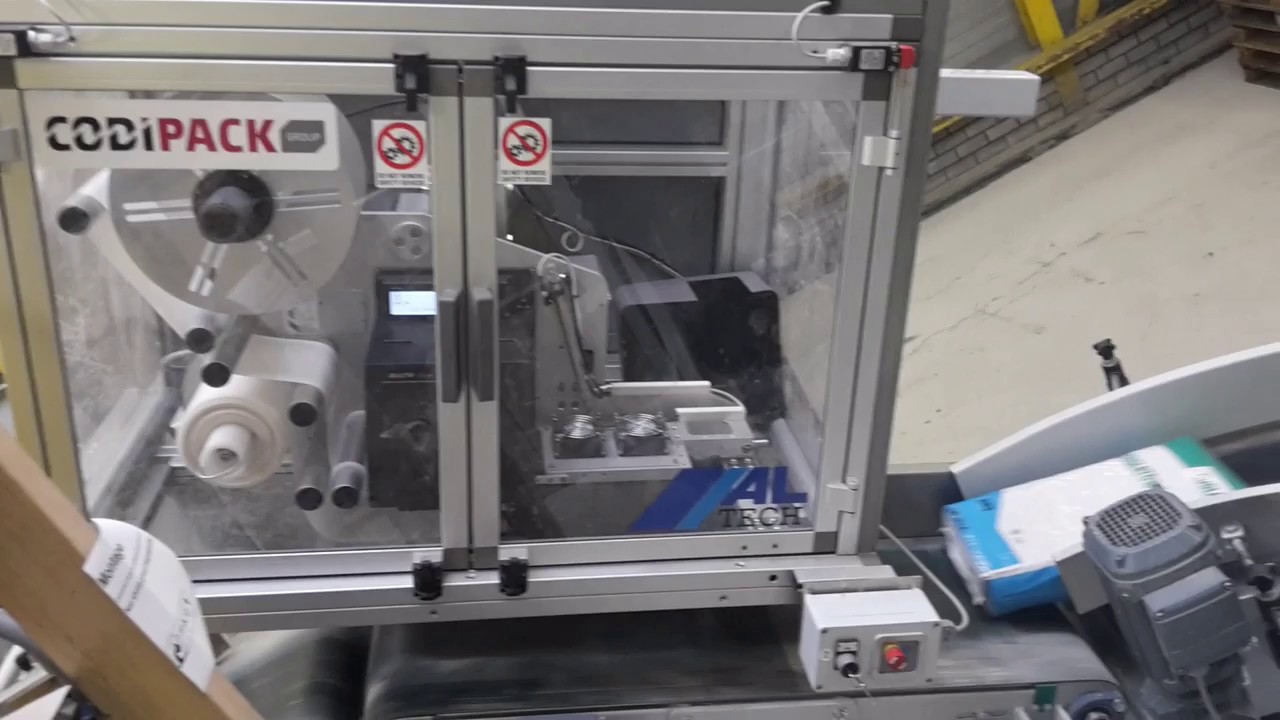 De bovenkant van een gevulde zak van etiket voorzien - Codipack Group ...