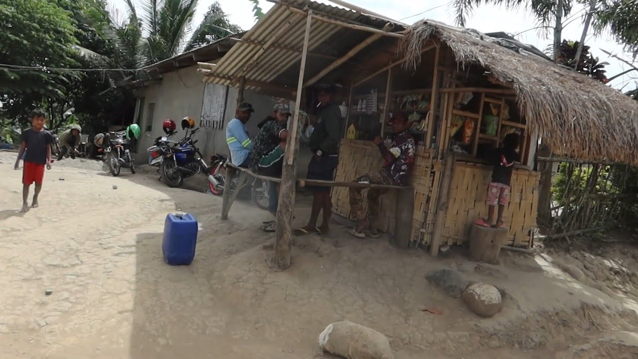 TOO the MOUNTAINS OF BAMBAN! Passed a Mountain Village along the way ...