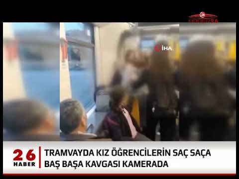 TRAMVAYDA KIZ ÖĞRENCİLERİN SAÇ SAÇA BAŞ BAŞA KAVGASI KAMERADA