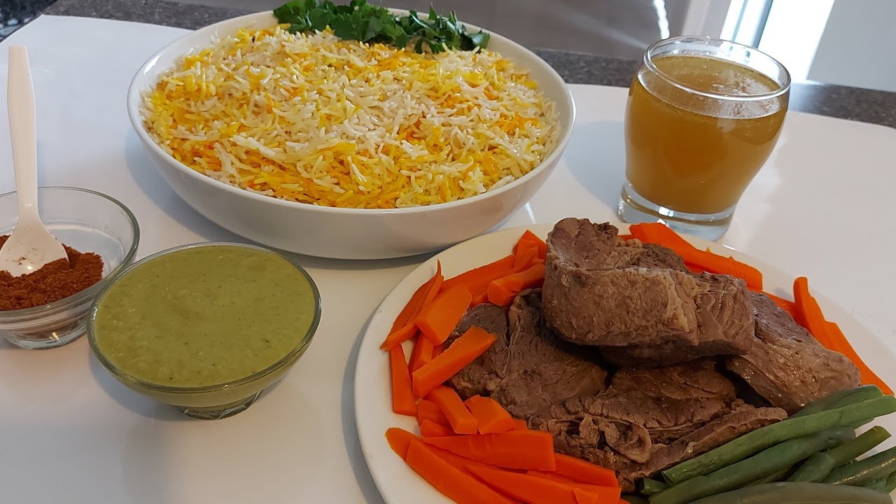 The top Somali traditional rice with meat and green chilli sauce.😋😋😋👌👌👌 ...