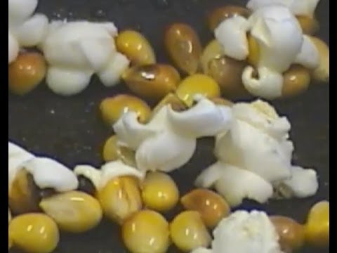 Popping popcorn in slow motion - YouTube