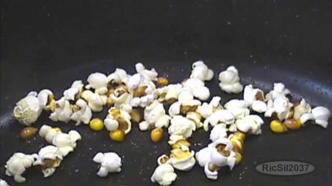 Popping popcorn in slow motion - YouTube