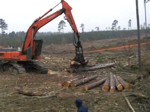 Track mounted log processor - YouTube