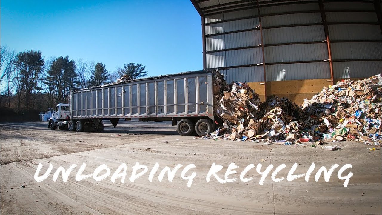 unloading full load of single stream recycling east walking floor - YouTube