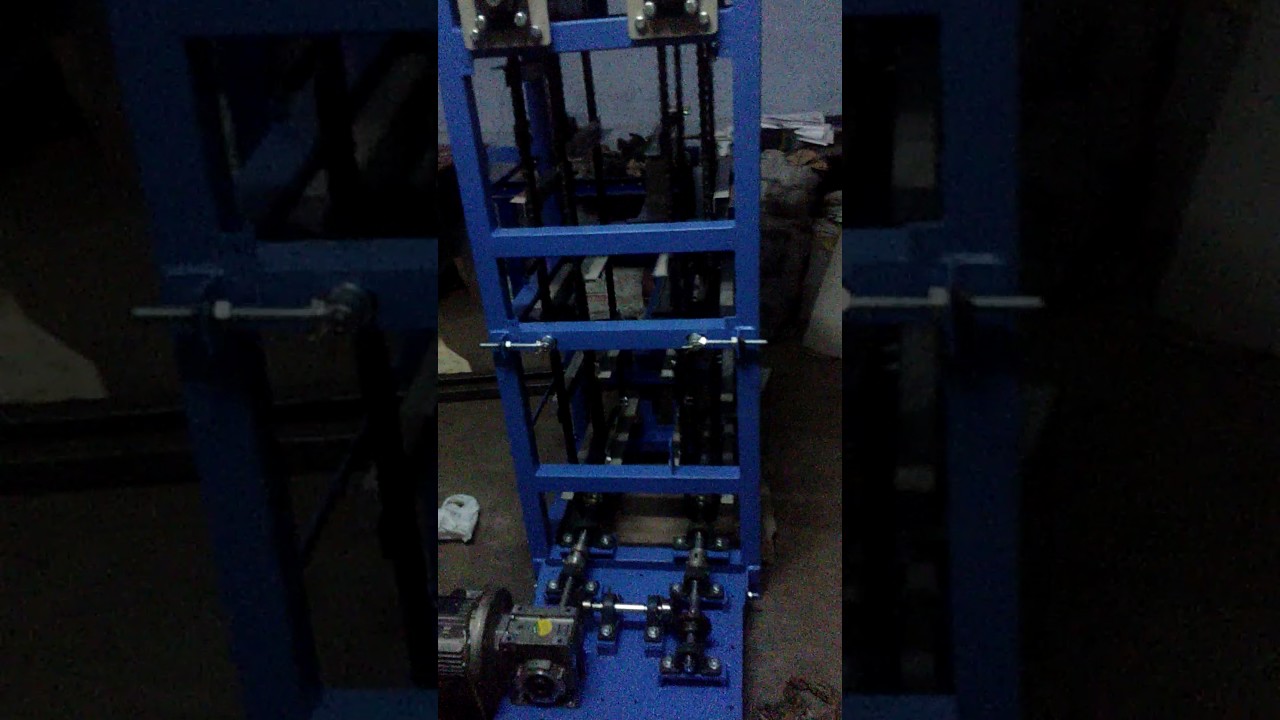 Vertical Chain conveyor - YouTube