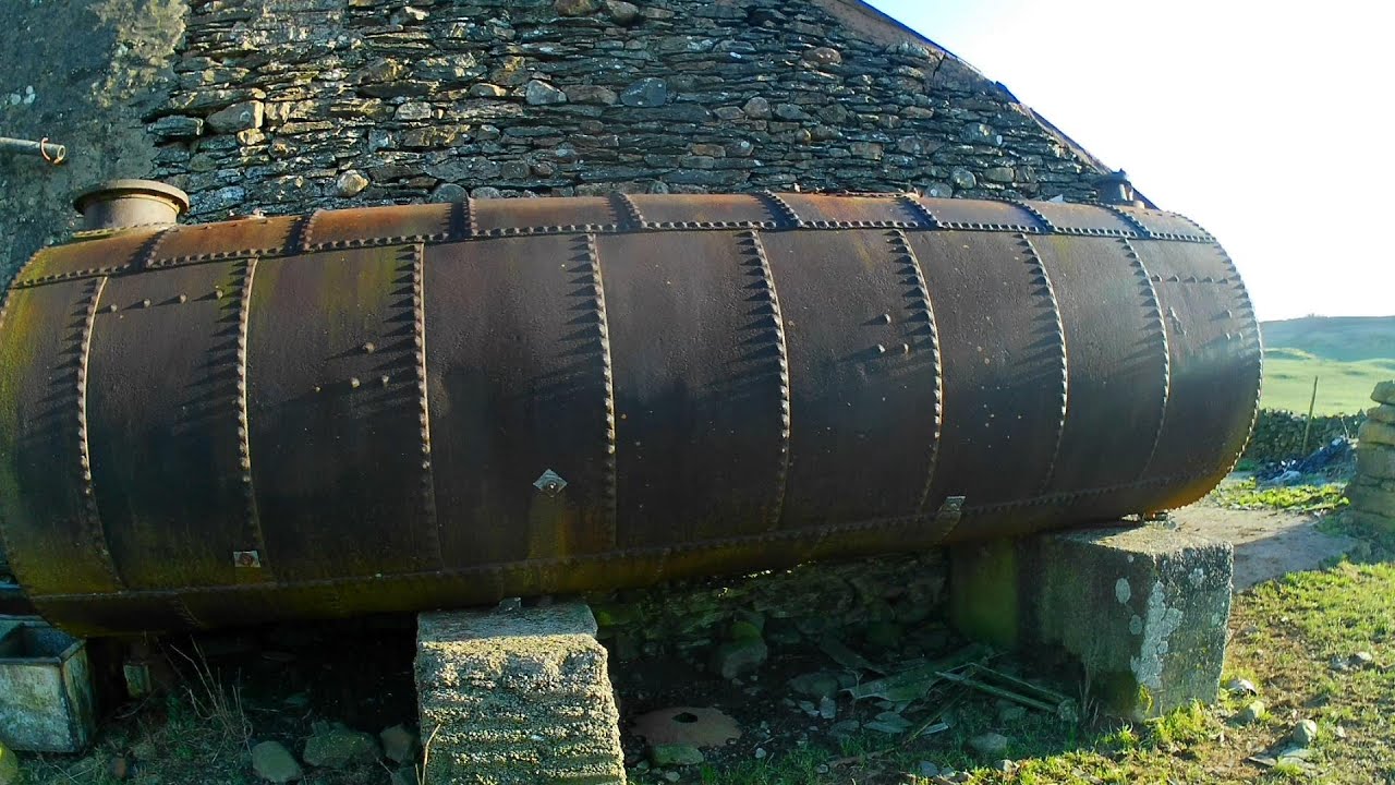 Old boiler from a steam engine reused as a water tank - YouTube