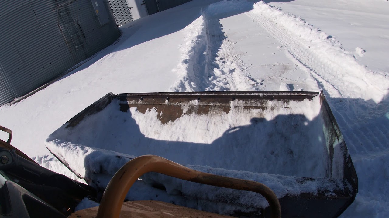 Moving snow with the CASE TR270 skid loader! - YouTube