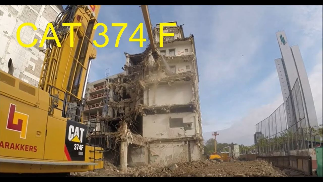 Demolition site with CAT 374 F longfront - YouTube