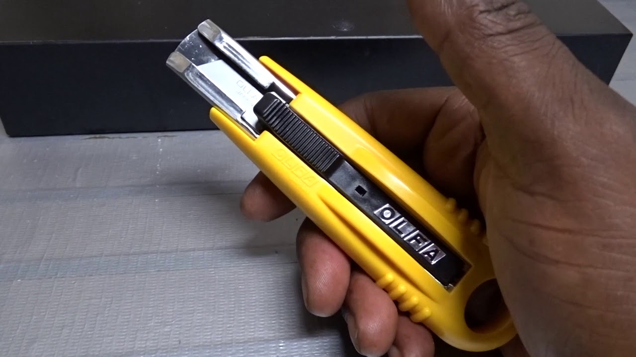 How To Use Olfa Self Retracting Safety Box Knife Review - YouTube