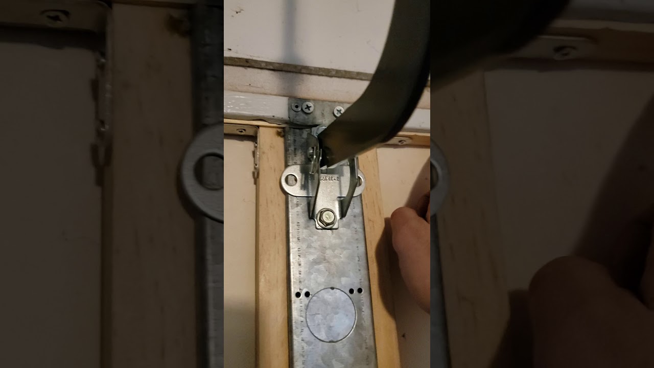 How to fix broken garage door header plate - YouTube
