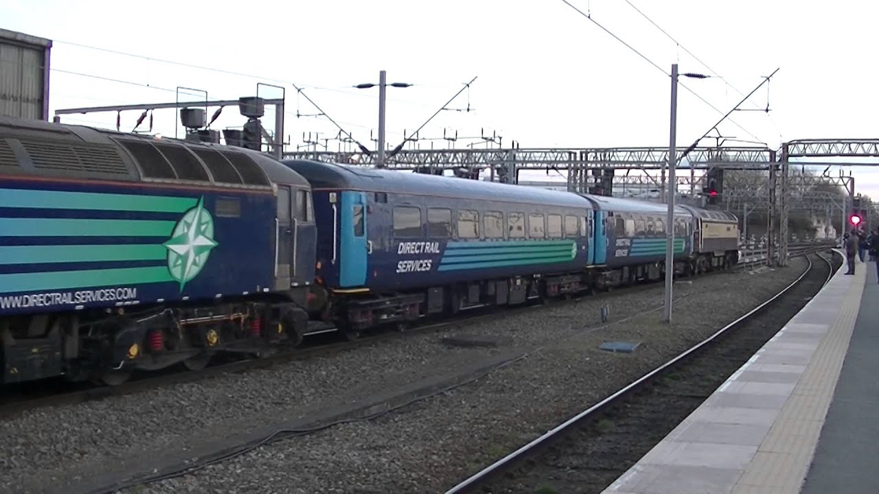 57305,57002 and 57312 arrive into Crewe with 2 DRS coaches 06/03/15 ...