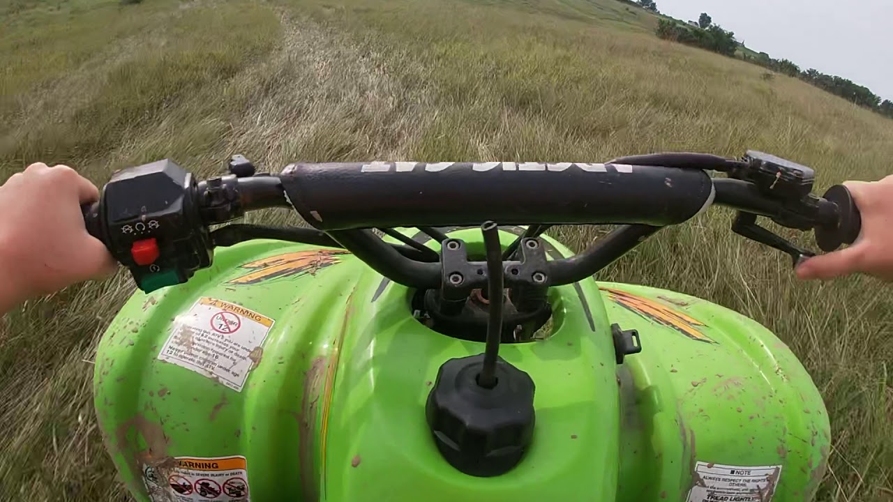 Driving my four wheeler - YouTube