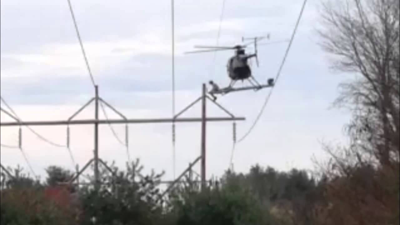Eversource works from helicopter in Southington - YouTube