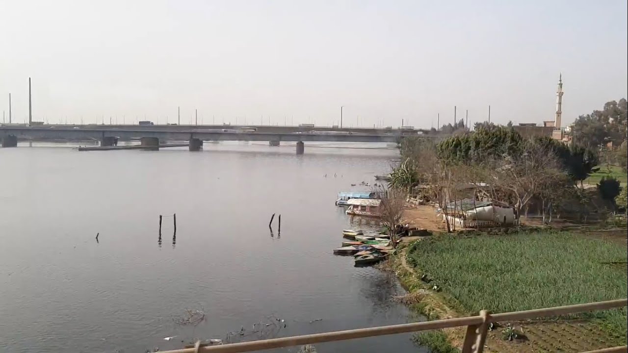 Crossing the Rail Bridge Over the Rosetta Branch of the River Nile ...