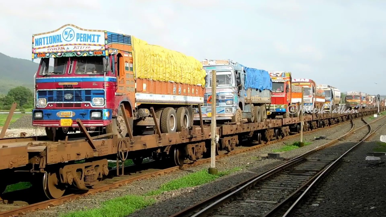 Konkan Railway RoRo Trucks Rolling off from RoRo freight train at Kolad ...