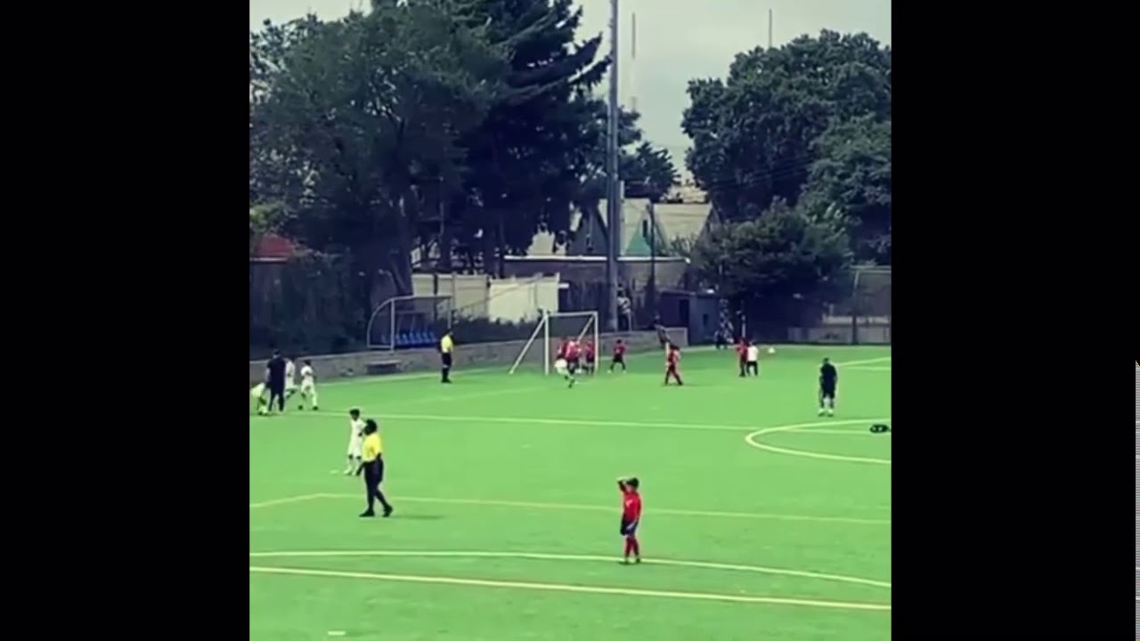 Amazing free kick by 8 year old - YouTube