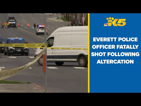 Everett police officer fatally shot following altercation in parking lot