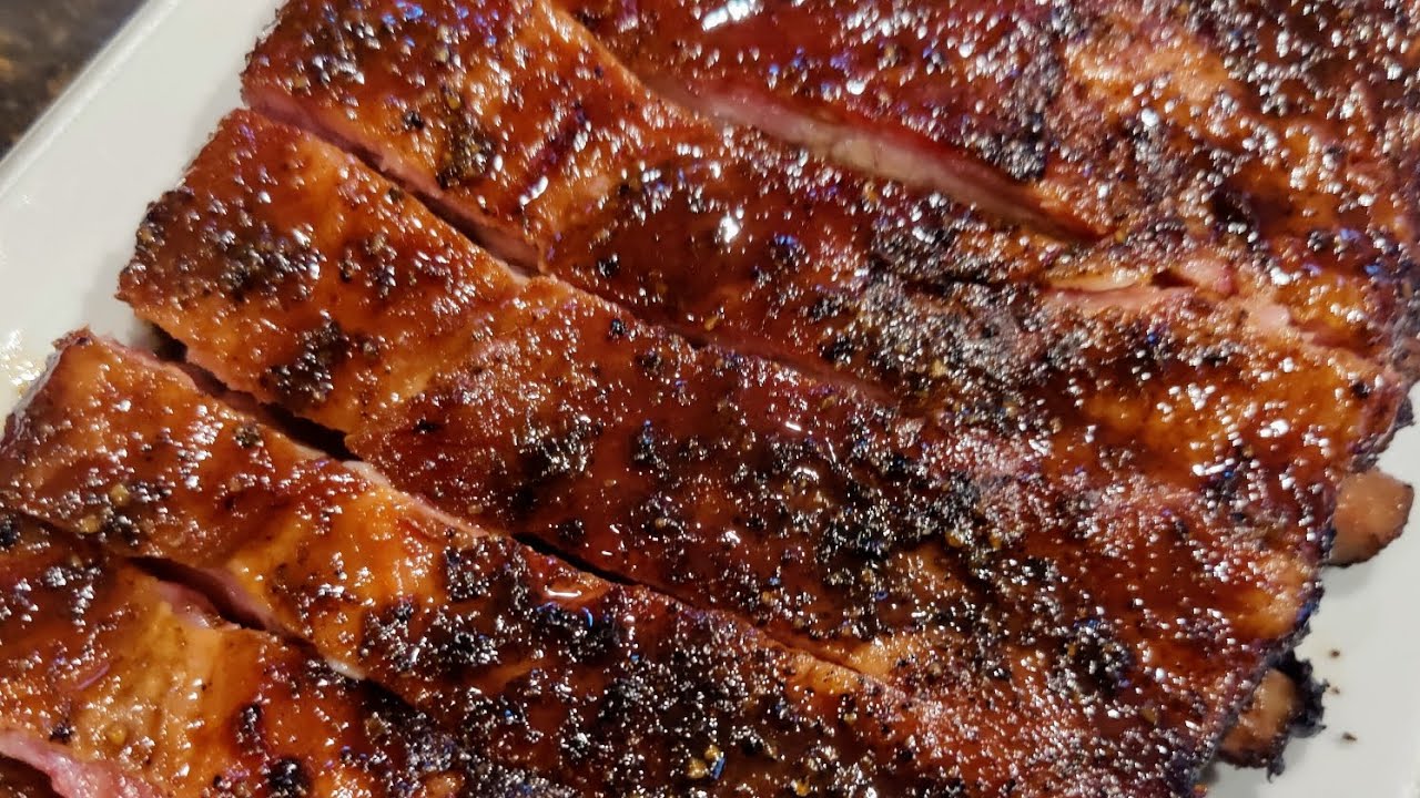 The process of Texas style smoked ribs. - YouTube