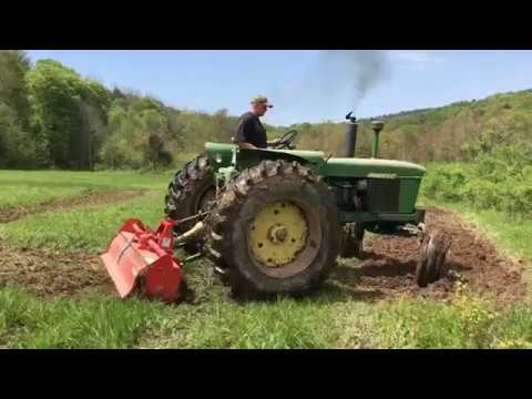 Rototilling the garden - YouTube