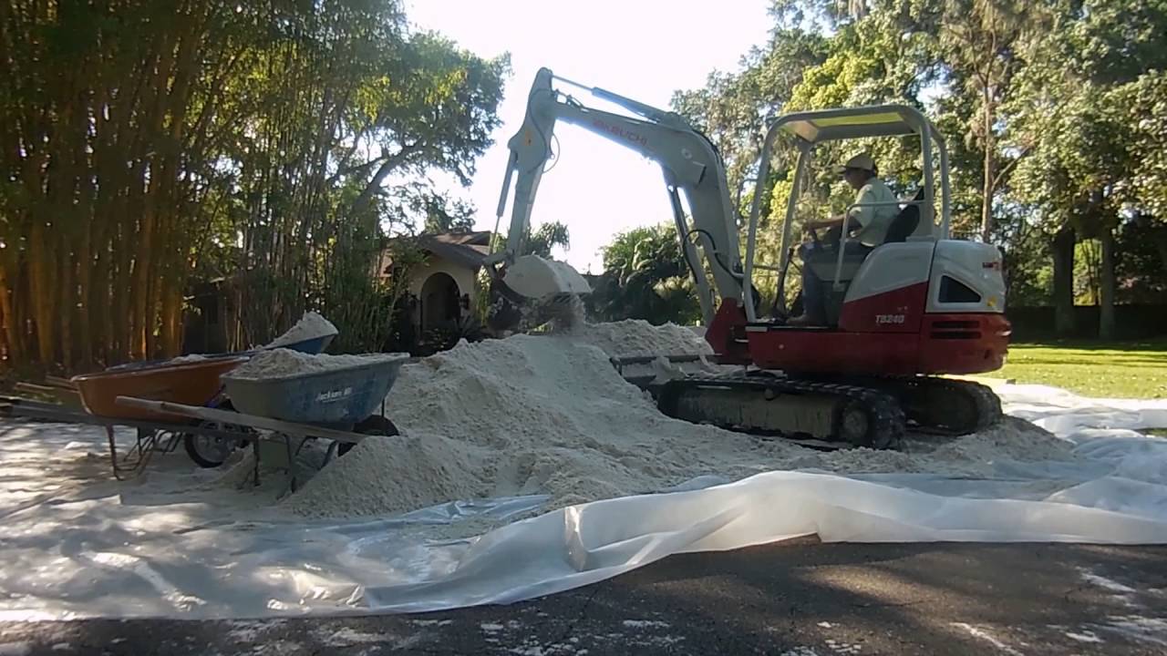 Using Sand For Shoreline Restoration Behind New Seawall 4/8/2016 - YouTube