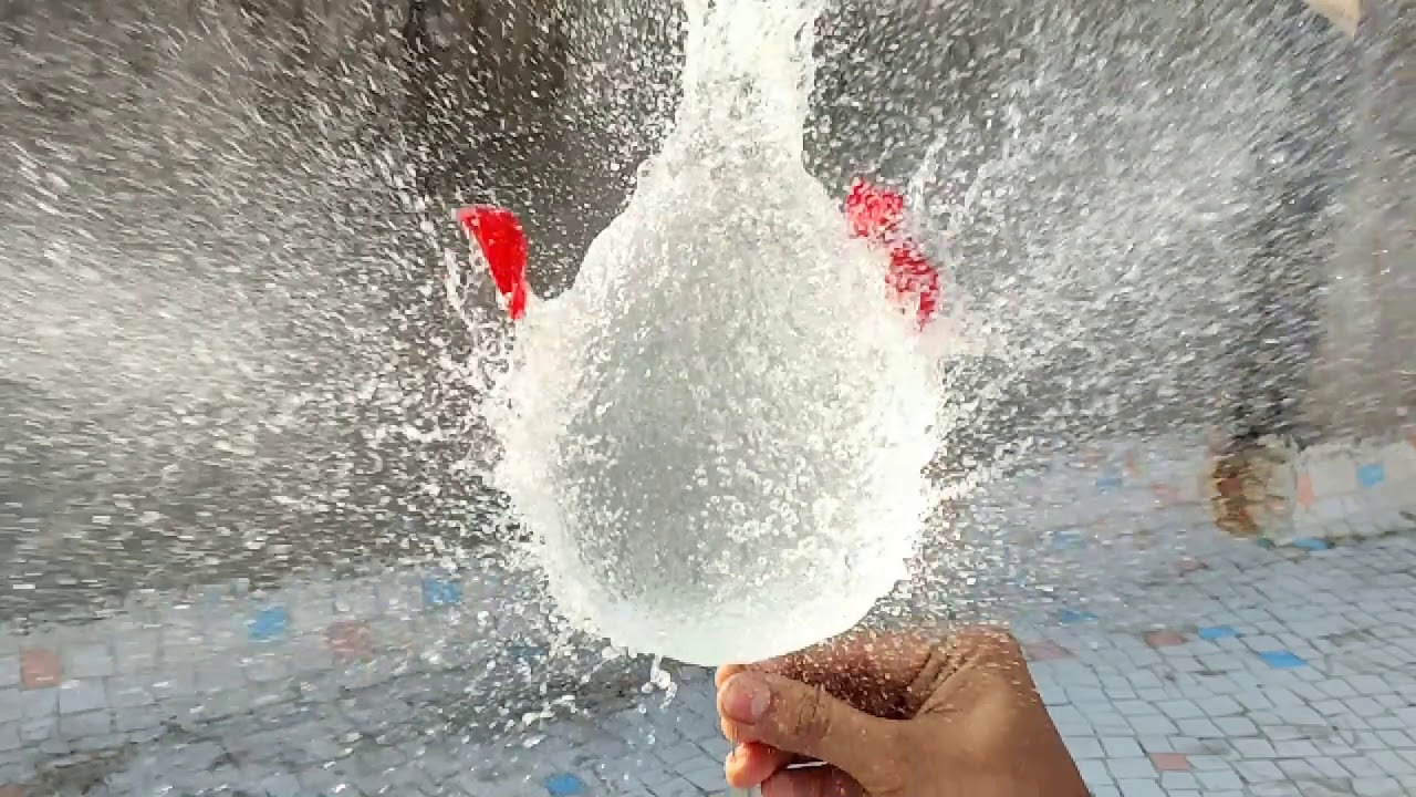 Water🎈 balloon🎈in slow motion looks like......! - YouTube