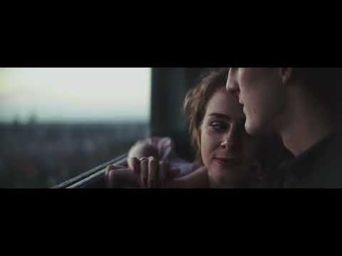 Couple Holding Each Other And Looking Out Of Window   Stock Video Footage