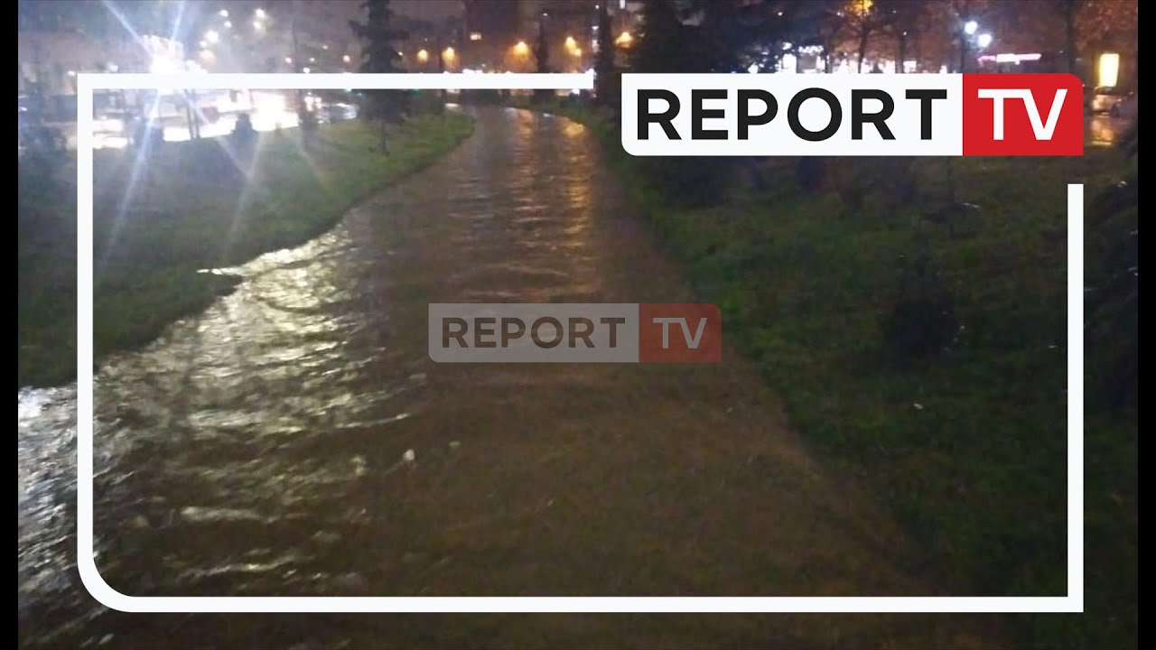 Report TV - Rreshjet e dendura të shiut në Tiranë, fryhet lumi Lana ...