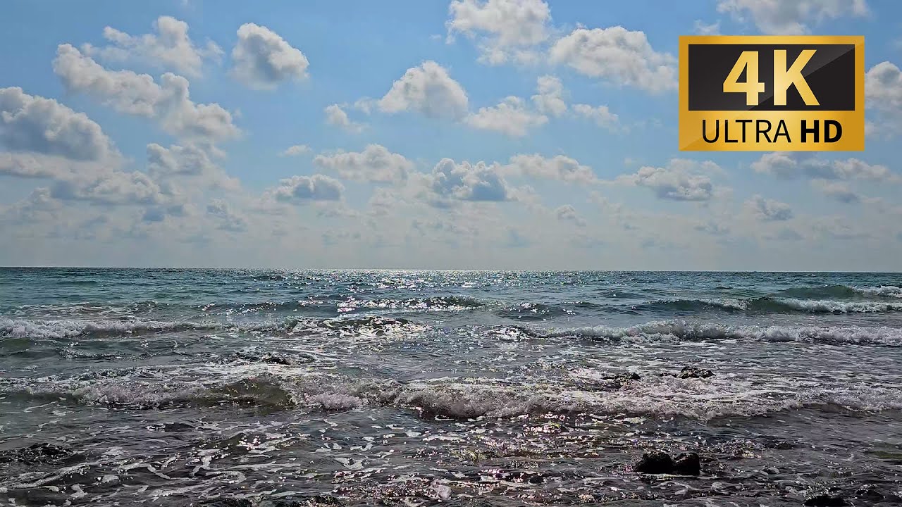 The sound of ocean waves on a beautiful beach for meditation and peace ...