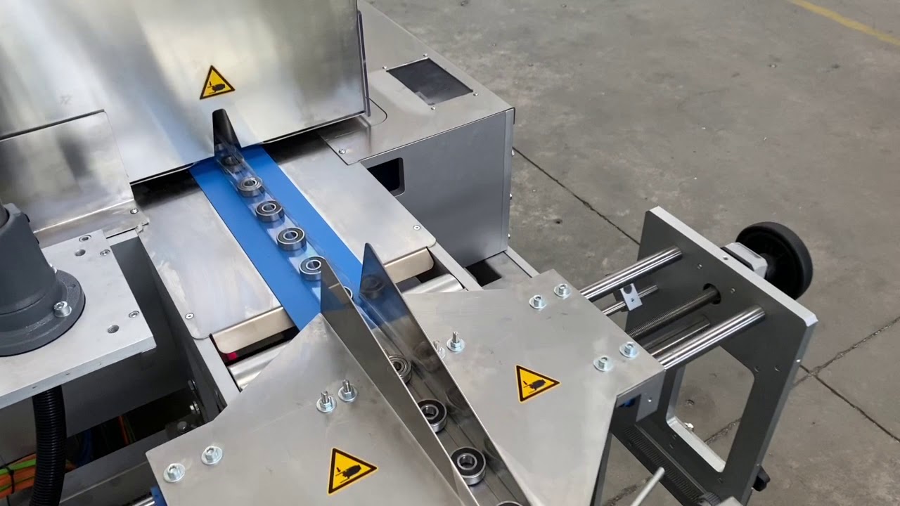 BP-008S Flow Pack machine for small bearings. Speed up to 70pc/minute ...