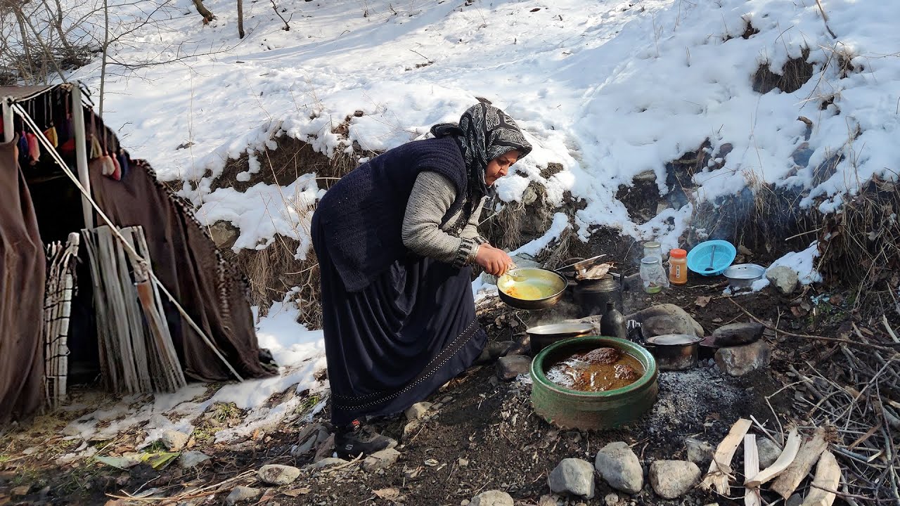 lifestyle of nomads in WINTER! - nomadic woman cooks FESENJAN for lunch ...