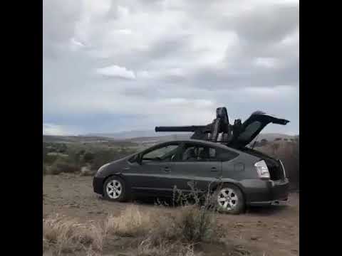 Machine gun Prius - YouTube