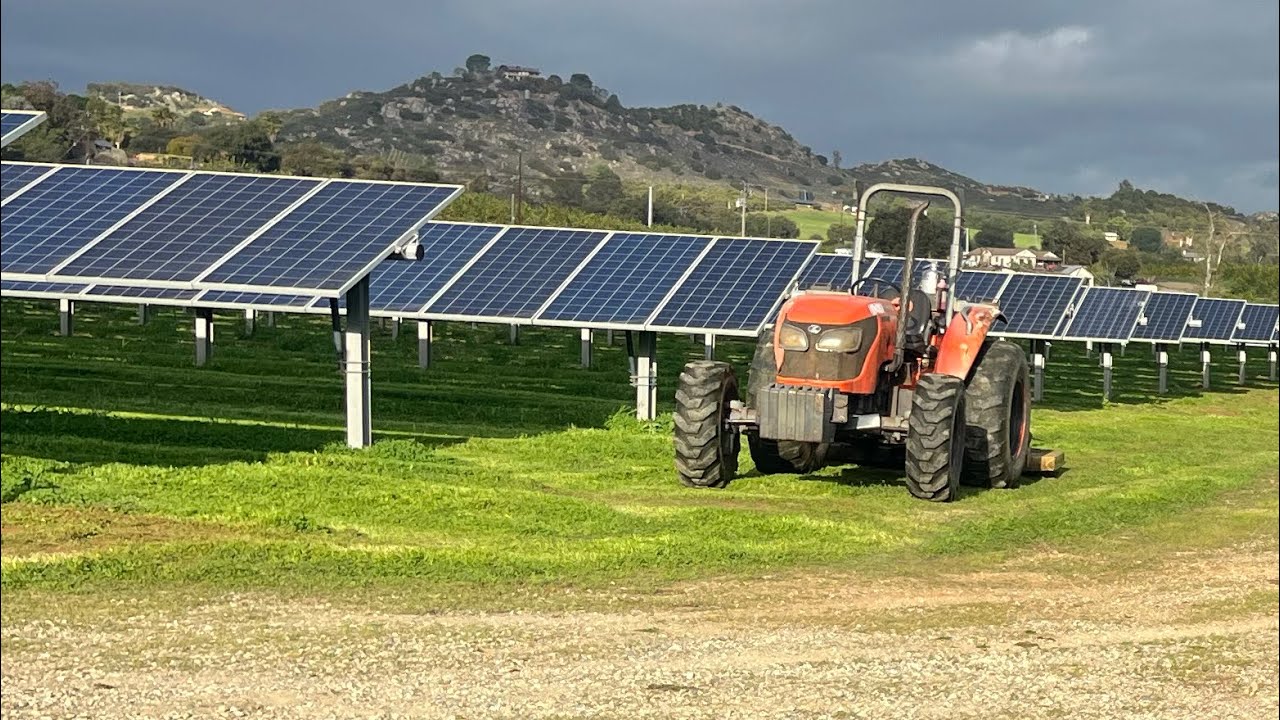 Solar farm mowing day 2 - YouTube