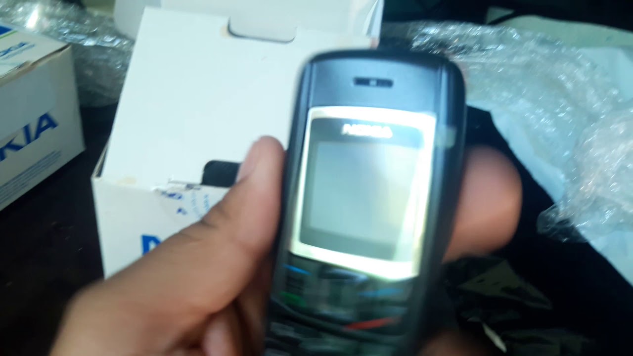Unboxing de nokia 1600 - YouTube