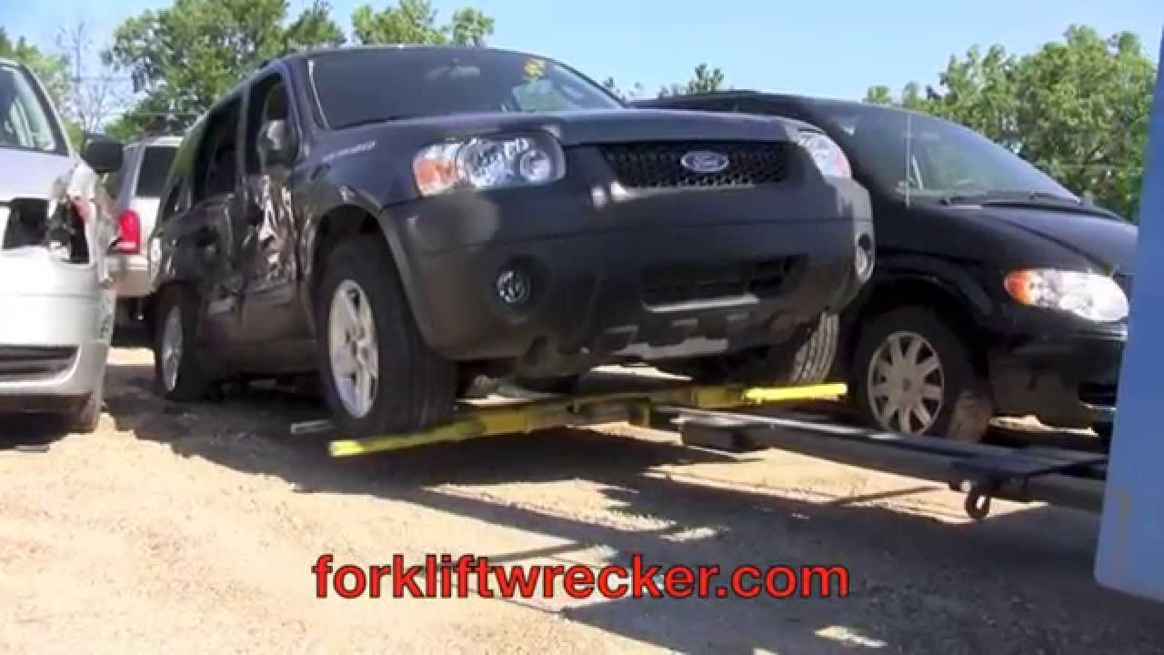 Forklift Wrecker Moving SUV with Rear Damage - YouTube